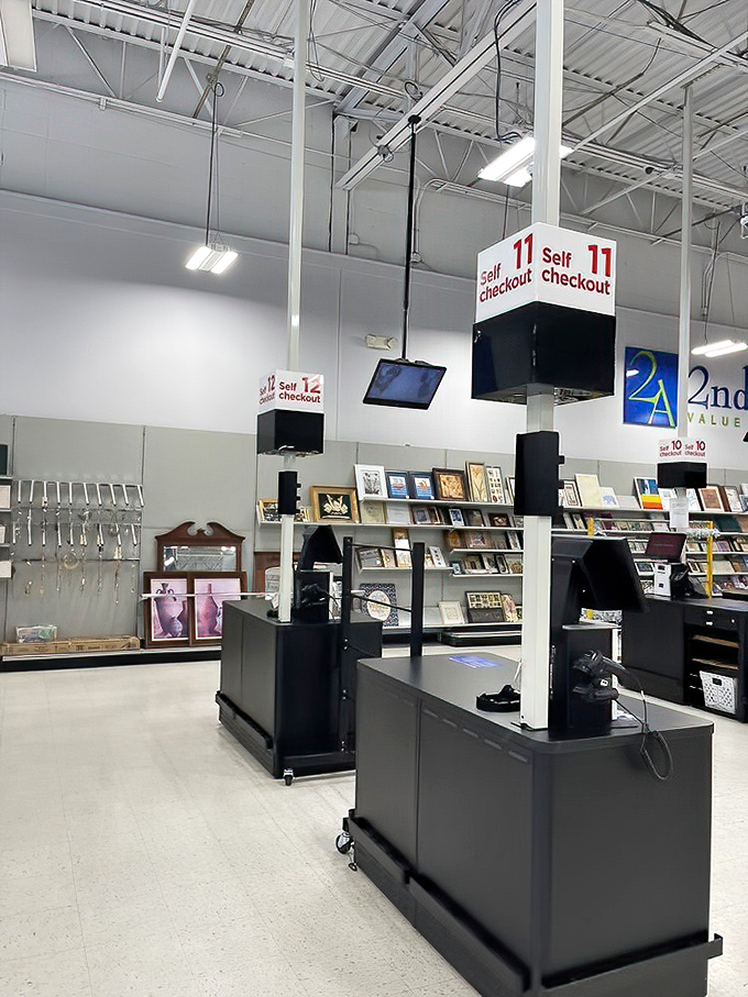 Self-checkout stations stand ready for your haul. The modern convenience feels almost incongruous in this temple of pre-loved merchandise.