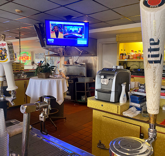 The bar area blends old-school charm with modern conveniences&mdash;where classic cocktails meet sports on TV in perfect harmony.