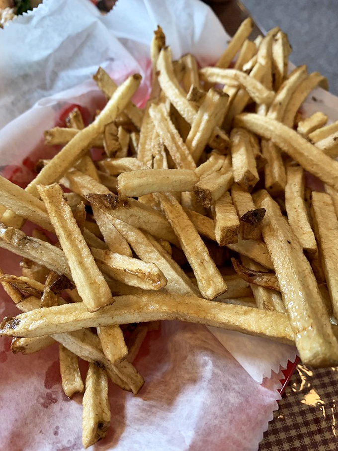 Golden shoestring fries that prove sometimes the simplest pleasures are the most satisfying ones.