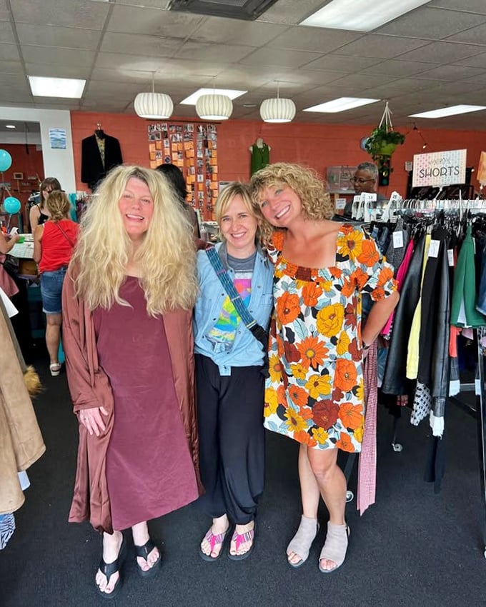 Happy customers model their finds, proving that great style discoveries create instant friendships and photo opportunities.