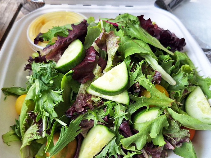 Even the side salad gets special treatment here&mdash;fresh greens, crisp cucumber, and a sense that someone actually cared about this often-overlooked plate companion.