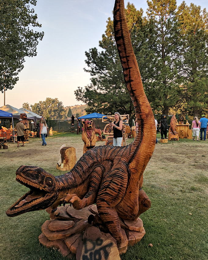 Wood carving festivals showcase local artistry &ndash; like this impressive dinosaur sculpture. Who knew prehistoric creatures were part of Yreka's charm offensive?