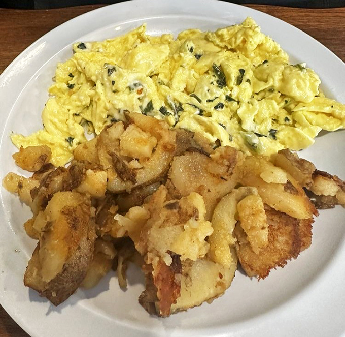 These scrambled eggs with spinach and golden home fries demonstrate that simple ingredients handled with respect create breakfast greatness.
