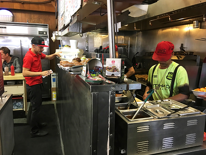 The kitchen crew moves with the practiced choreography of people who've turned breakfast into both science and art.