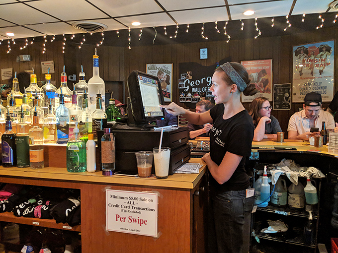 Behind every great meal is someone who cares enough to get it right. The focused expression says it all&mdash;your order matters here.