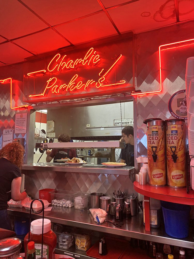 Elvis watches over diners from his vinyl kingdom. The King would approve of this temple to American comfort food and its unapologetic deliciousness.
