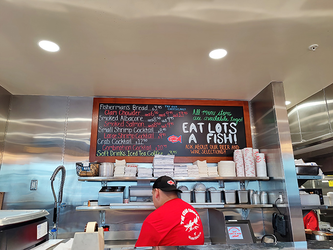 The staff, decked out in signature red, ready to guide you through a menu where "fresh catch" isn't marketing&mdash;it's a promise.
