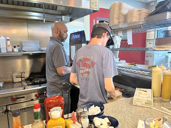 Where the magic happens. The kitchen crew orchestrates your breakfast symphony with practiced precision and a dash of flair.