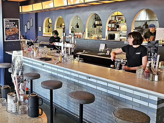 Behind the counter, the crew navigates breakfast service with the precision of mission specialists, turning orders into edible art.