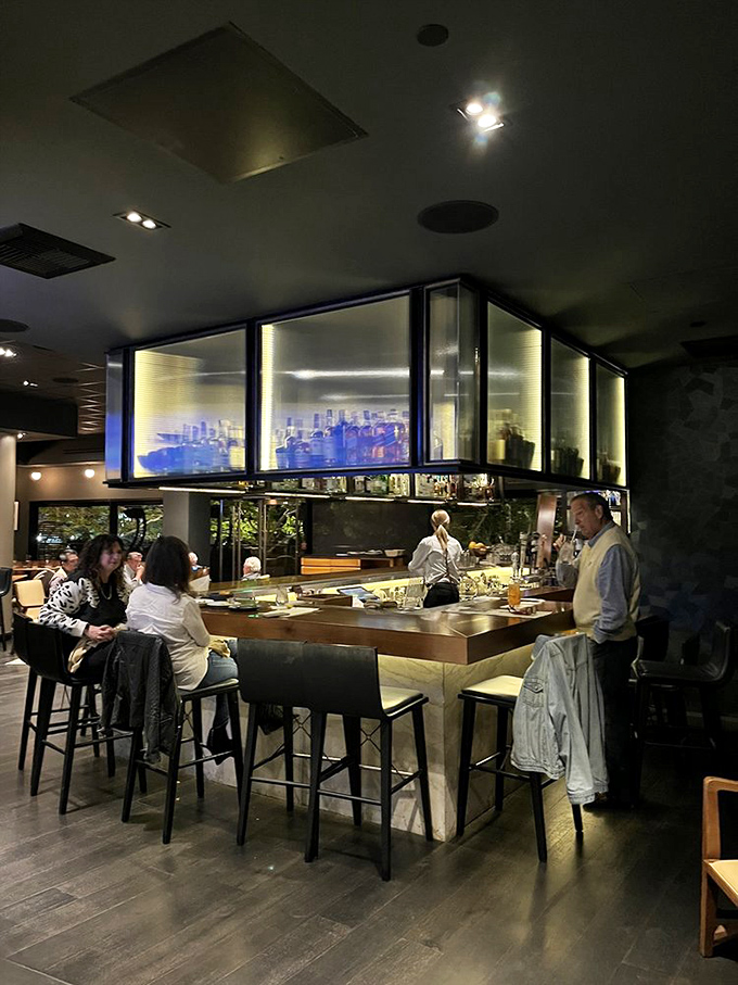 Where culinary magic happens—a bar where strangers become friends united by the universal language of exceptional food and drink.