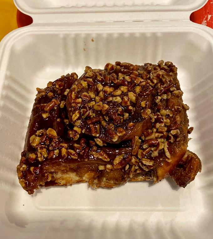 Sticky buns glazed with enough pecans and caramel to make your dentist schedule a vacation.