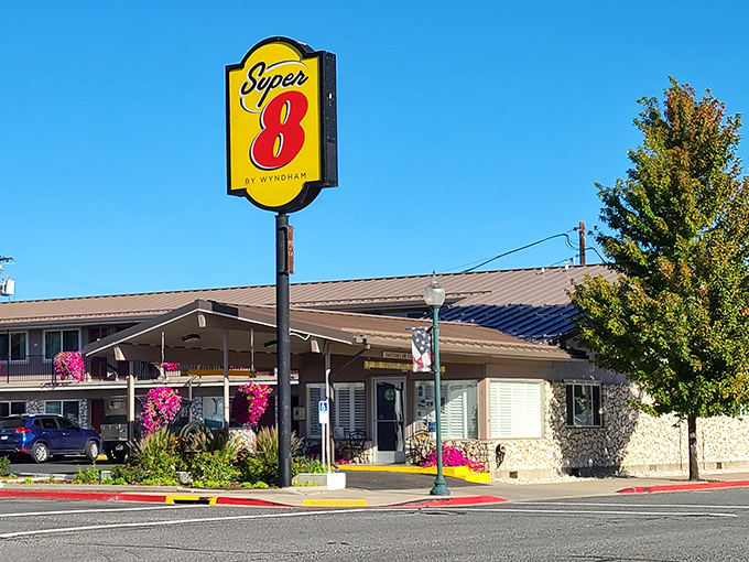 The Super 8 welcomes visitors with hanging flower baskets that say, "We may be a chain hotel, but we've got local pride."