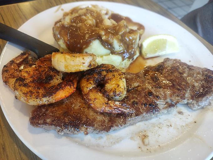 Surf meets turf in this classic plate where seasoned shrimp and a perfectly cooked steak prove that sometimes more really is more.