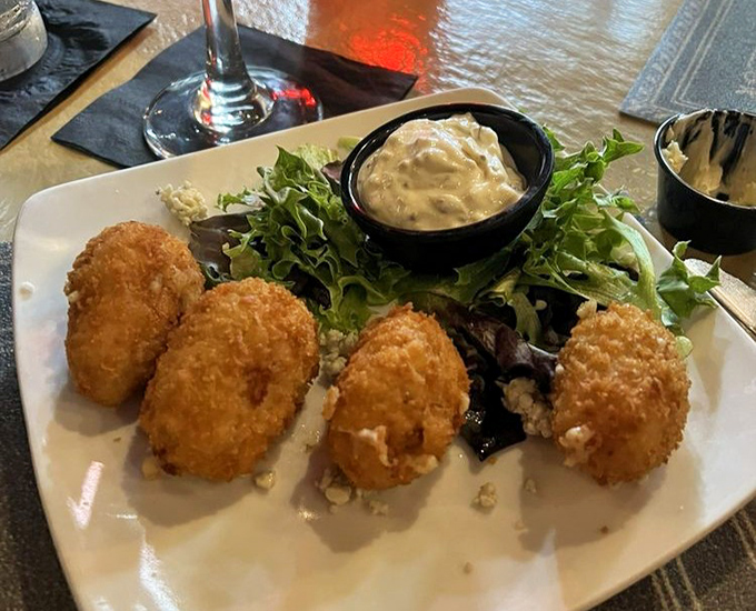 Golden-fried perfection meets garden-fresh greens. These aren't your drive-thru tater tots&mdash;they're a sophisticated nod to childhood favorites.