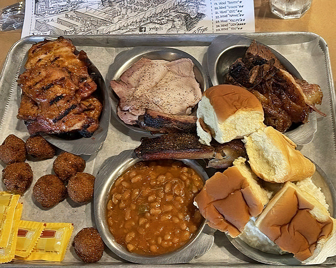 The "Baby Bear" platter isn't for cubs&mdash;this serious spread features multiple meats, sides, and bread that could satisfy a hibernating grizzly.