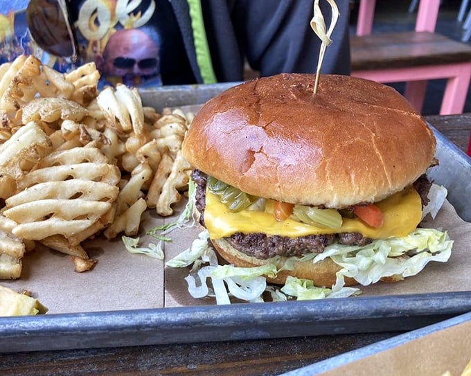 This isn't just a burger, it's an architectural achievement &ndash; layers of cheese, pickles and beef on a bun that somehow maintains structural integrity.