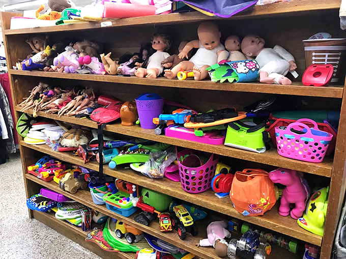 Toy shelves bursting with potential playtime – where forgotten dolls, trucks, and games await their second chance at childhood magic.