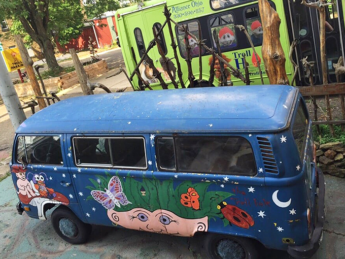 The troll-mobile sits ready for magical journeys, looking like what would happen if Woodstock attendees decided to customize a VW van.