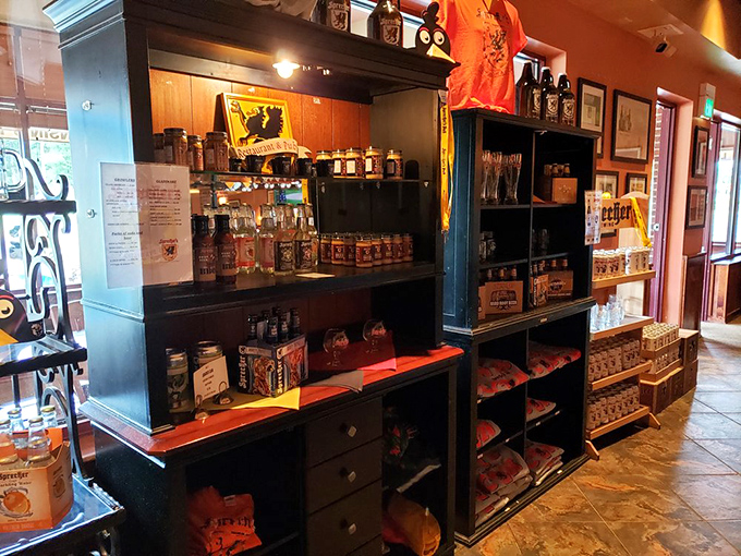 A retail corner featuring local spirits and branded merchandise &ndash; because the best souvenirs are the ones you can taste again.