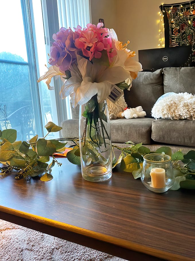 Flowers may be fake, but the style is real. This vase arrangement is ready to brighten a corner without demanding water or attention.