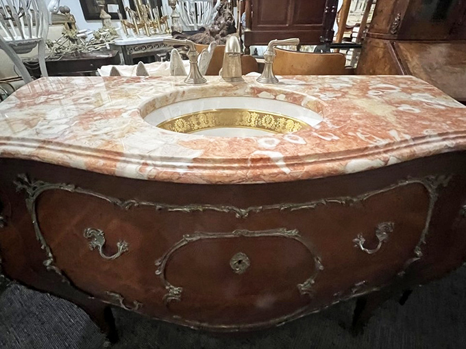A marble-topped vanity that would make Versailles jealous. Just imagine the morning routines that once happened at this elegant piece.