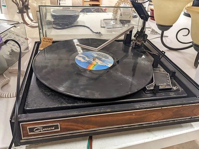 That vintage Garrard turntable isn't just playing records&mdash;it's spinning portals to decades when music was something you could hold.
