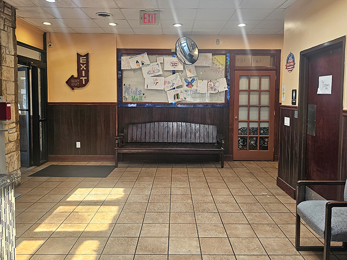 The waiting area's bulletin board tells the community's story&mdash;a patchwork of local events, children's drawings, and neighborly connections.