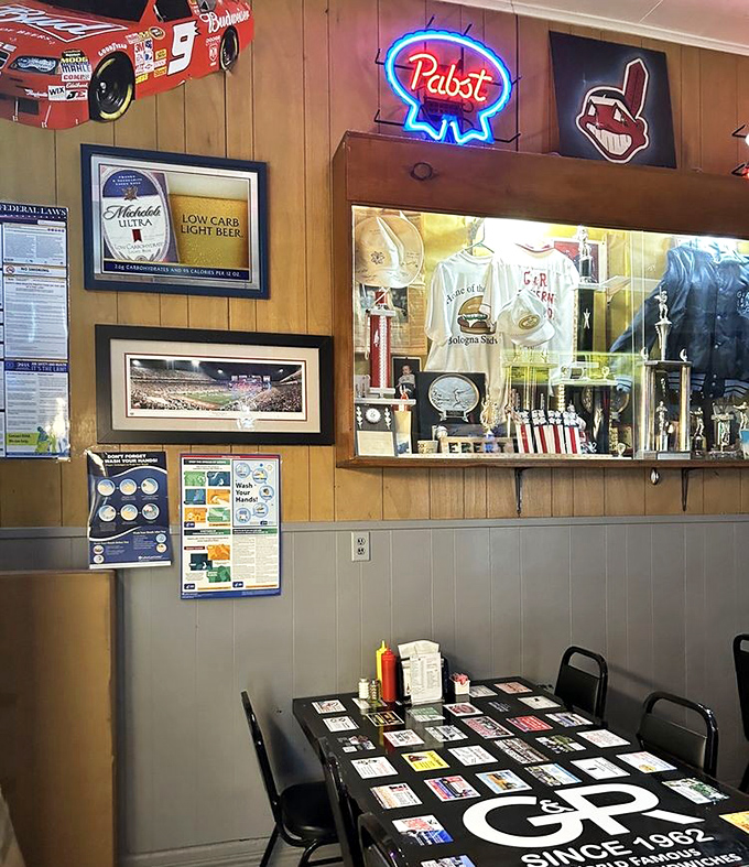 Sports memorabilia and local treasures line the walls. Every item tells a story about the community that has gathered here for decades.