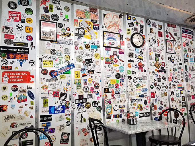 Wall-to-wall memories: where stickers, photos, and mementos create a tapestry of the community that's grown around this beloved diner.