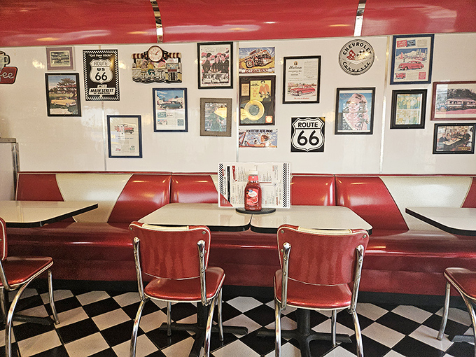 Every great diner needs a wall of memorabilia. Route 66 signs and vintage advertisements create the perfect backdrop for comfort food consumption.