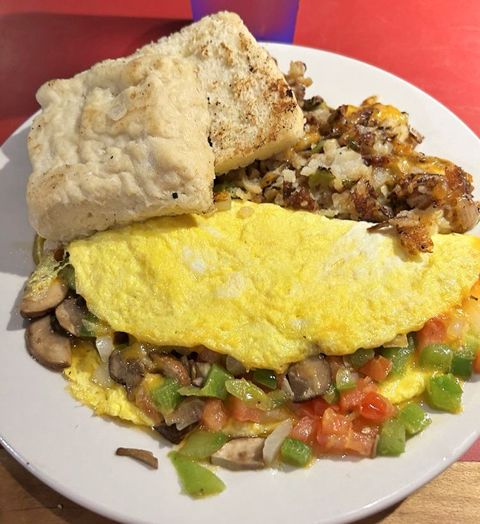 Western tradition meets morning perfection in this fluffy, cheese-filled masterpiece of breakfast engineering.