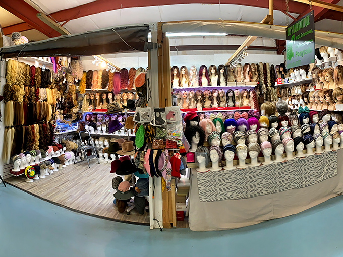 The wig wall presents a rainbow of reinvention possibilities &ndash; from subtle enhancements to bold transformations, all waiting patiently on their mannequin hosts.