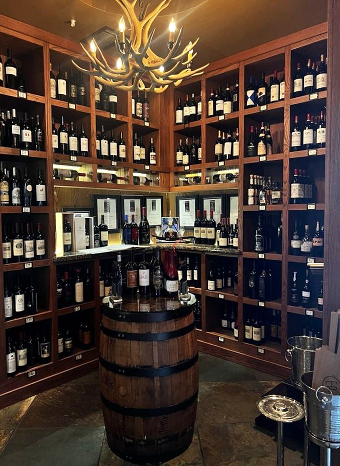 The wine room, where an antler chandelier watches over bottles from around the world, is like a temple dedicated to the religion of perfect pairings.