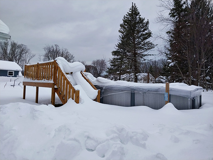 Winter transforms Conneaut into a snow globe come to life, where even hot tubs hibernate under thick blankets of white.