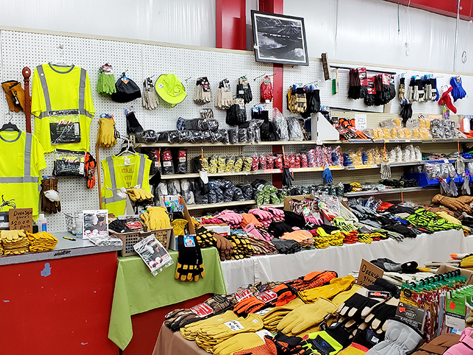 Work gloves and safety vests hang like badges of honor. This booth celebrates the hands that build America, one pair of reinforced fingertips at a time.