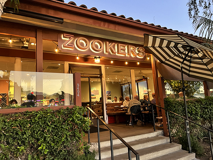 Zookers' warm glow beckons hungry travelers with the promise of California cuisine in a setting that balances casual comfort with coastal sophistication.