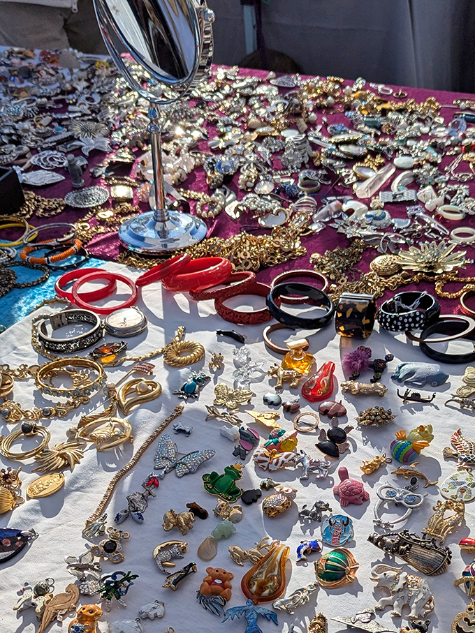 Jewelry heaven! This dazzling display of vintage brooches, necklaces and rings would make Elizabeth Taylor's collection look positively restrained.