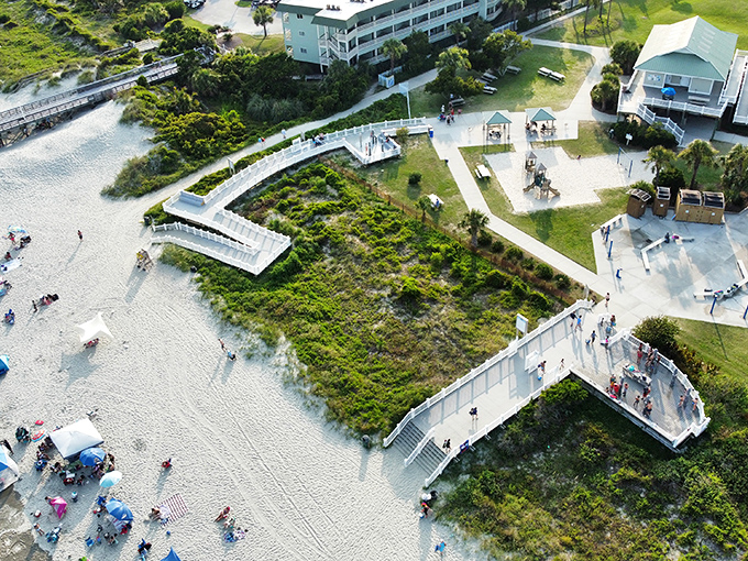 A bird's-eye perspective reveals the thoughtful design of Isle of Palms County Park, where pathways gracefully connect beach, dunes, and amenities.