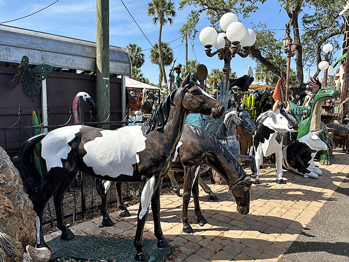 This herd of metal horses seems caught mid-gallop, their pinto patterns gleaming in the Florida sunshine like carousel animals freed from their poles.