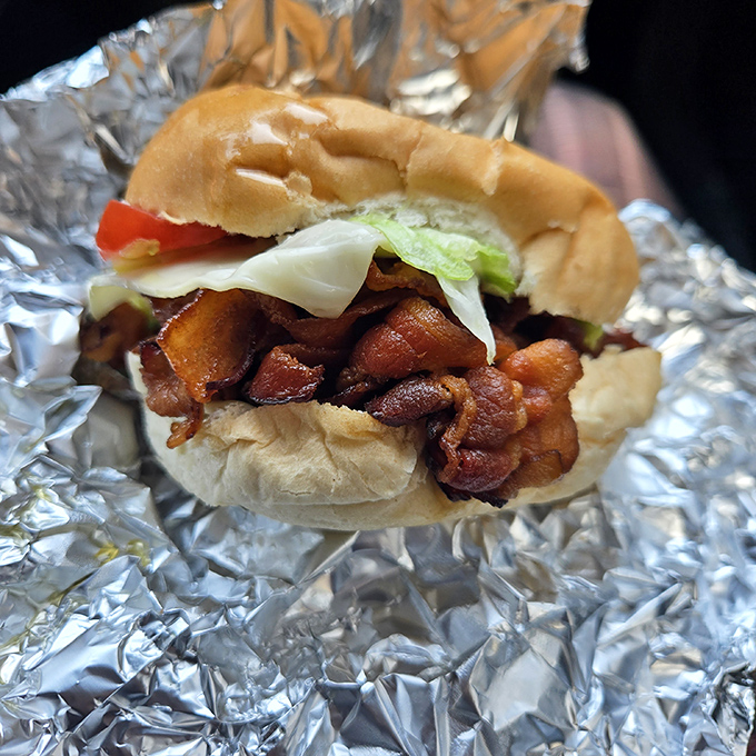 This bacon-loaded sandwich isn't just lunch &ndash; it's a masterclass in texture, flavor, and the art of proper meat-to-bun ratio.