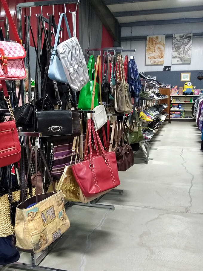 Handbag heaven! Designer lookalikes and genuine vintage finds hang like colorful fruit, ripe for the picking.