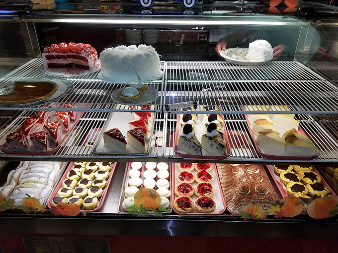 The dessert case&mdash;where willpower goes to die. Each slice and pastry whispers sweet promises that are impossible to resist.