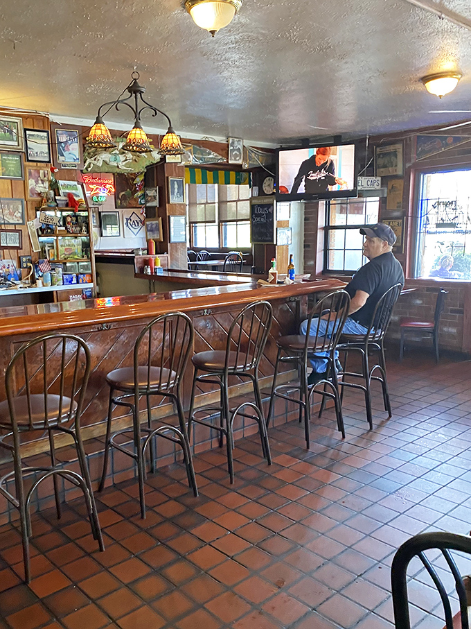 The bar at El Cap&mdash;where strangers become friends and regulars are treated like royalty. Those swivel stools have supported generations of burger enthusiasts.