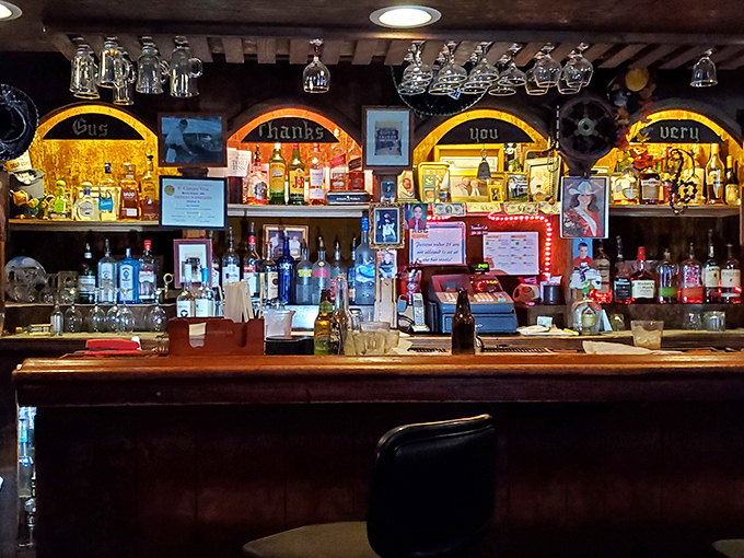 A bar that tells stories without saying a word. "God thanks you very much" arches over bottles that promise liquid courage and vacation vibes.
