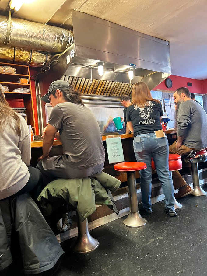 The heart of any great diner beats strongest behind the counter where magic happens daily.