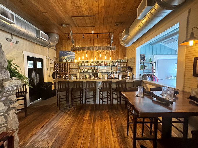 A bar that strikes the perfect balance between "I'm on vacation" and "I have excellent taste," with wooden accents warming the space.