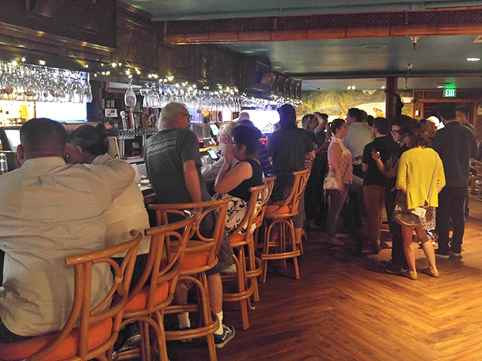 The bar scene at Damon's &ndash; where strangers become friends and friends become slightly louder friends as the Mai Tais work their magic.