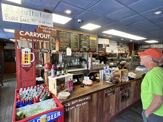 The ordering counter&mdash;where dreams are verbalized and hunger meets its match. Notice the "We don't stop cooking 'til you stop eating" sign? Challenge accepted.