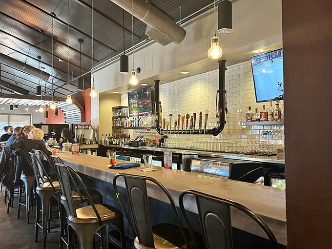 The bar at Station 101 isn't just where drinks are served—it's command central for an evening of serious enjoyment.