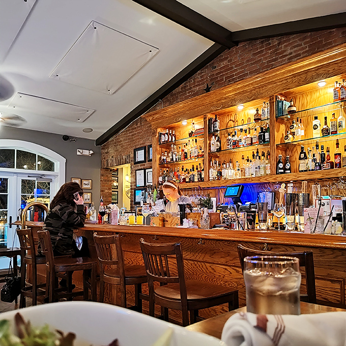 The bar at Hendel's isn't just well-stocked – it's a community gathering spot where strangers become friends and bartenders remember your usual after just one visit.